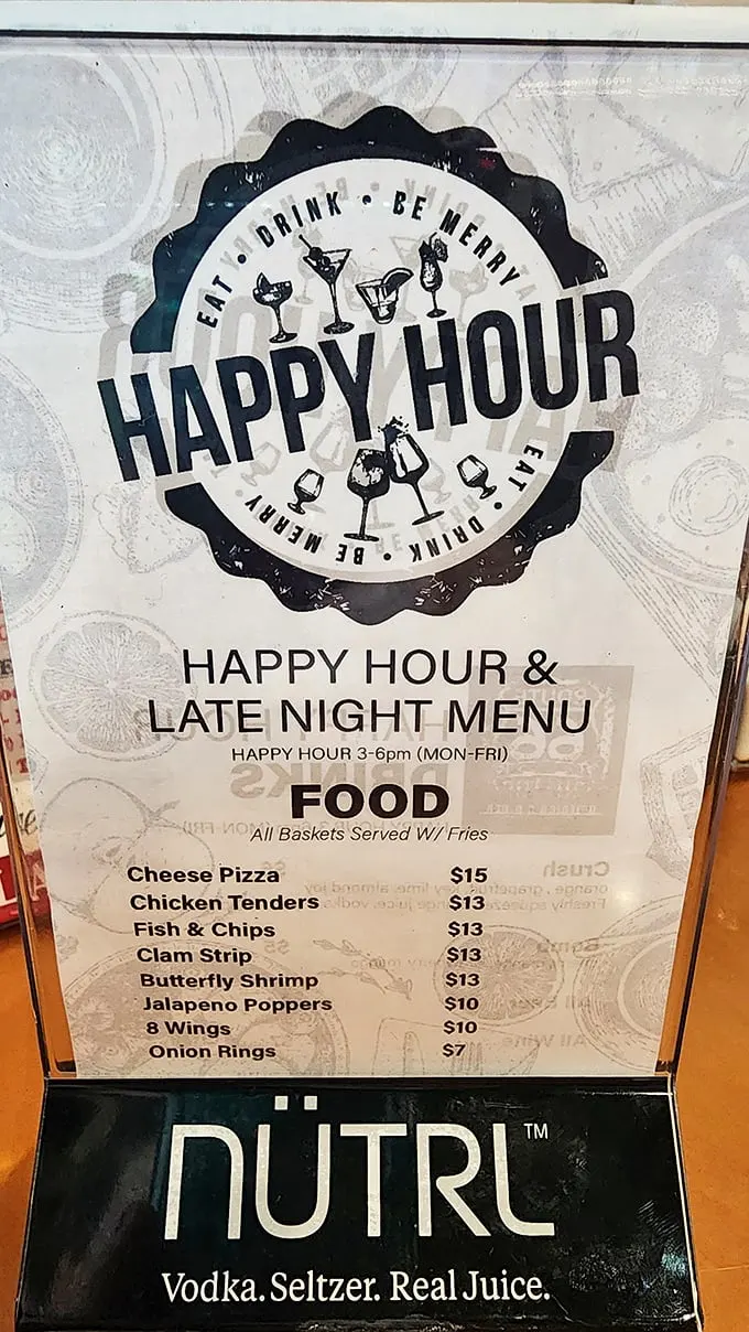 The happy hour menu promises all the greatest hits of American comfort food. "Eat, drink, be merry" isn't just a suggestion—it's practically the house motto.