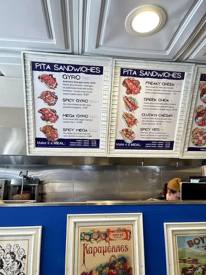 The menu board—a roadmap to happiness. Each option more tempting than the last, like a Choose Your Own Adventure where every ending is delicious.