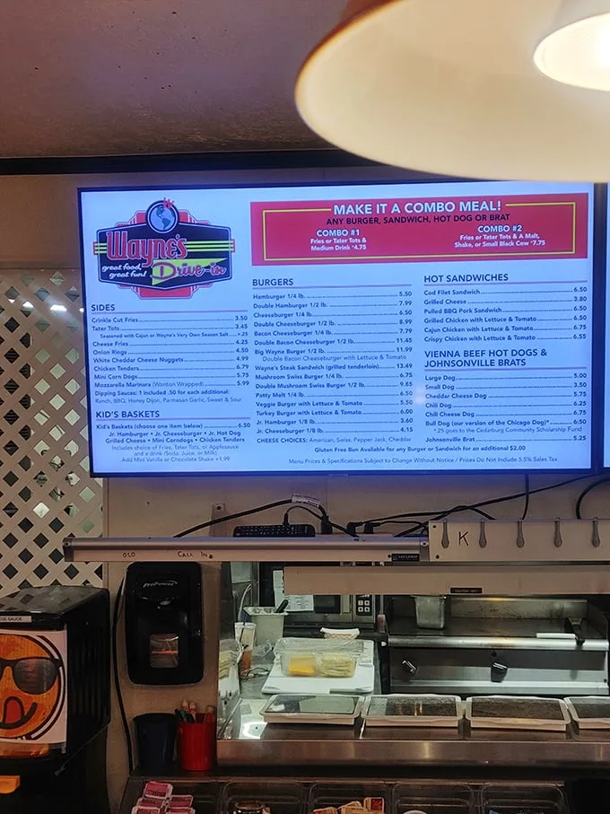 The menu board at Wayne's isn't just a list of food—it's a roadmap to happiness with options that'll make your cardiologist wince and your taste buds sing.