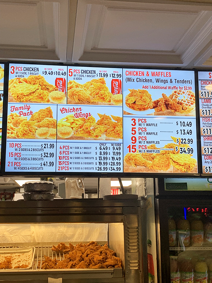 The menu board at Legends isn't just a list – it's a roadmap to happiness with chicken as your trusty vehicle and waffles as your delicious destination.