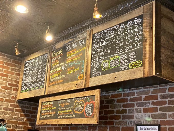 The chalkboard menu isn't just information—it's a promise of caffeinated bliss. Each carefully written item represents a potential life-changing sip waiting to happen.