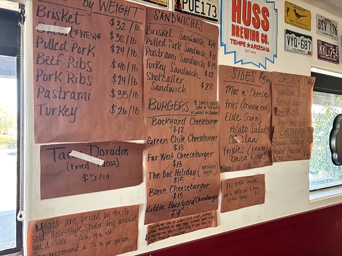 The butcher paper menu—barbecue's version of sacred texts—reveals a mouthwatering lineup of smoked treasures sold by the pound.