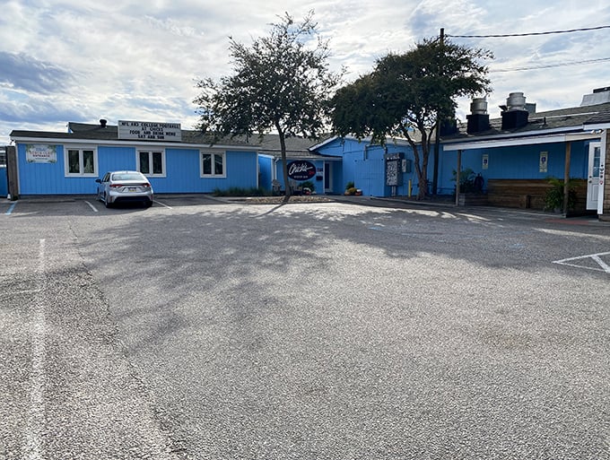Chick's bright blue exterior is like a beacon for seafood lovers—follow it to oyster paradise on Lynnhaven Inlet.