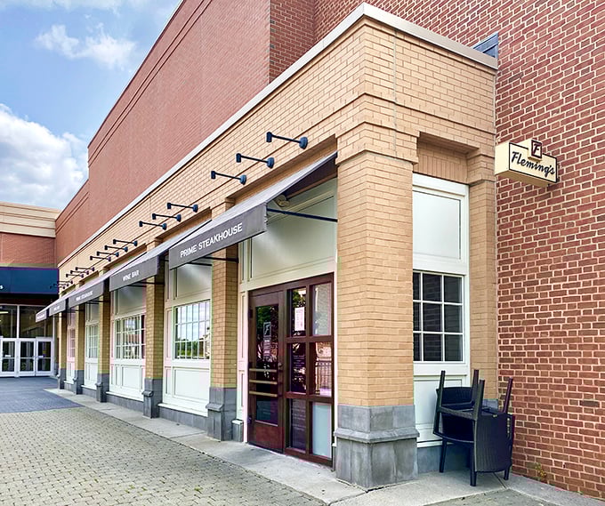 Fleming's elegant brick exterior whispers "special occasion" – but their steaks shout "come back every week!"