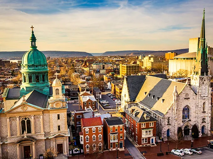 Harrisburg's historic district glows at dusk, proving state capitals can be both majestic and surprisingly affordable.