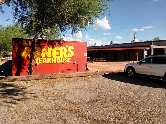 Li'l Abner's bold red exterior is like a dinner bell for your eyes. No pretension here – just the promise of serious steak.