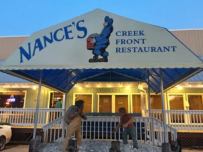 Nance's blue awning welcomes seafood pilgrims like an old friend saying, "Come on in, the crab legs are fine!"