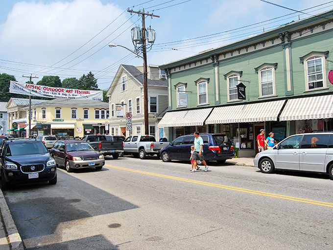 Old Mystic's storefronts create a colorful welcome. No filter needed for this Instagram-worthy main drag!
