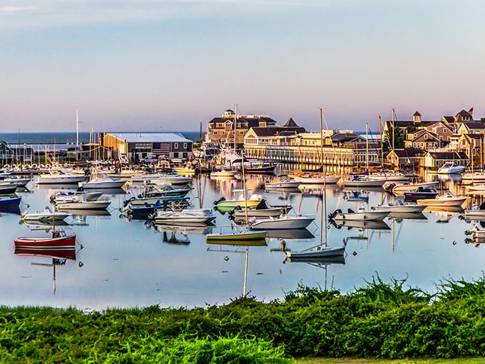 Chatham's harbor at golden hour, when boats rest like sleeping birds and the water mirrors the sky's watercolor show.
