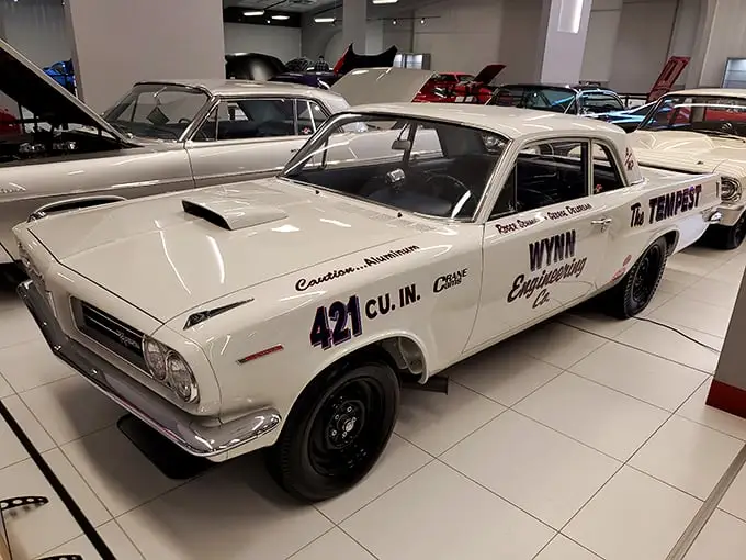 This 1963 Pontiac Tempest isn't just a car – it's American muscle history with racing pedigree, wearing its "421 CU. IN." badge like a medal of honor.