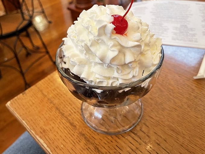 Mount Whipped Cream with a cherry flag on top! This brownie sundae isn't dessert – it's an expedition worth every delicious step.