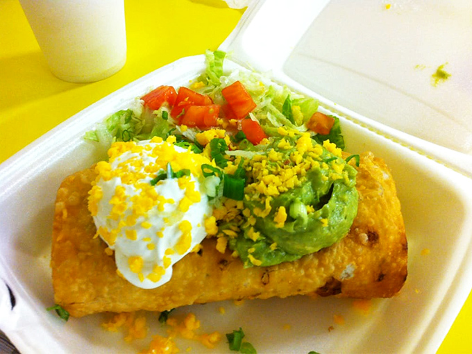 Golden-fried perfection topped with cool sour cream and vibrant guacamole. This chimichanga isn't just a meal—it's a Phoenix institution on a plate.