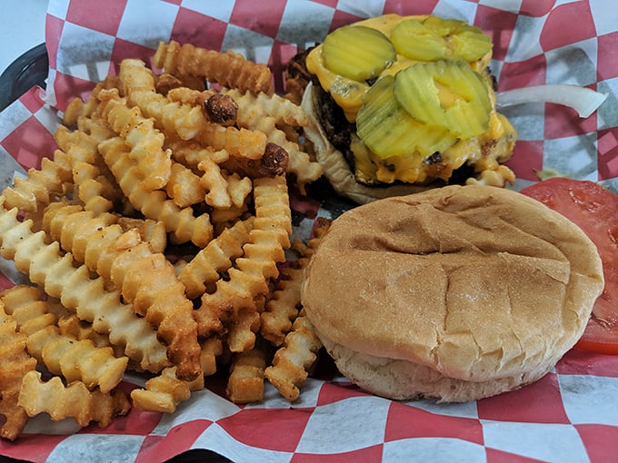 This isn't just a burger and fries – it's edible therapy on a red-checkered paper that whispers, "Everything's gonna be alright."