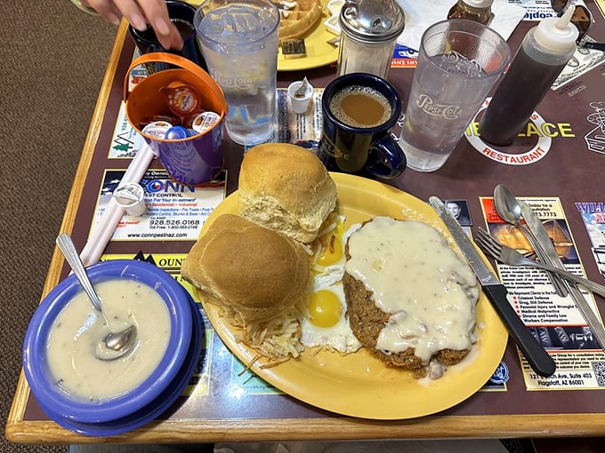The holy trinity of breakfast: eggs, gravy, and a chicken fried steak that could make a vegetarian question their life choices.