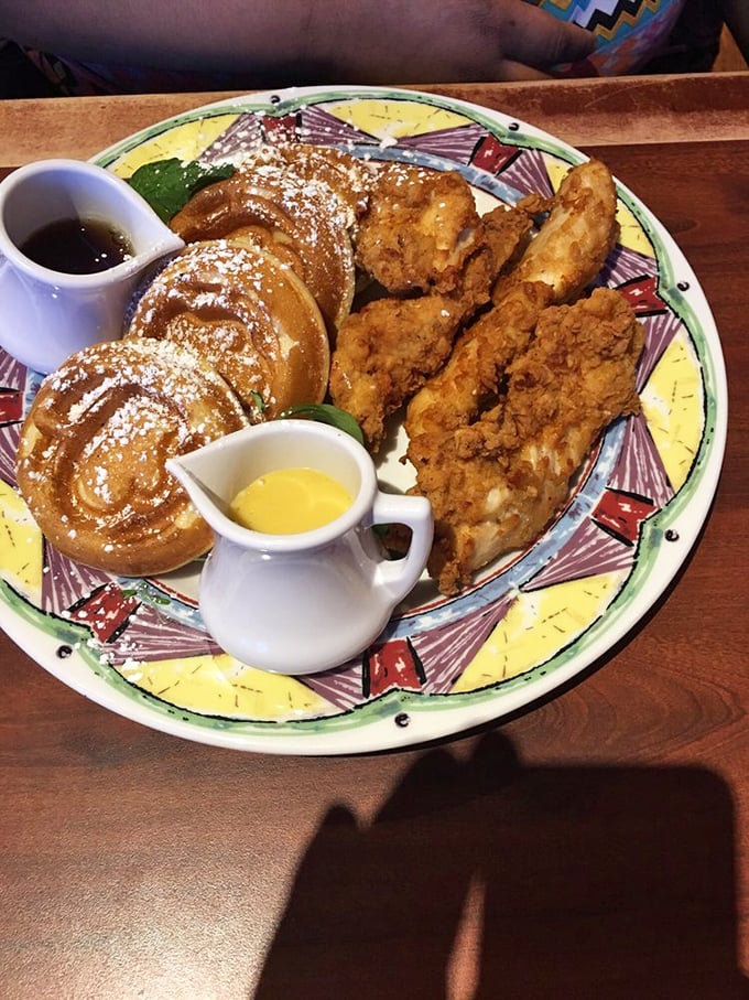 The holy matrimony of breakfast and lunch: golden-brown chicken cozied up to cinnamon-dusted waffles. Maple syrup stands by as the official witness to this delicious union.