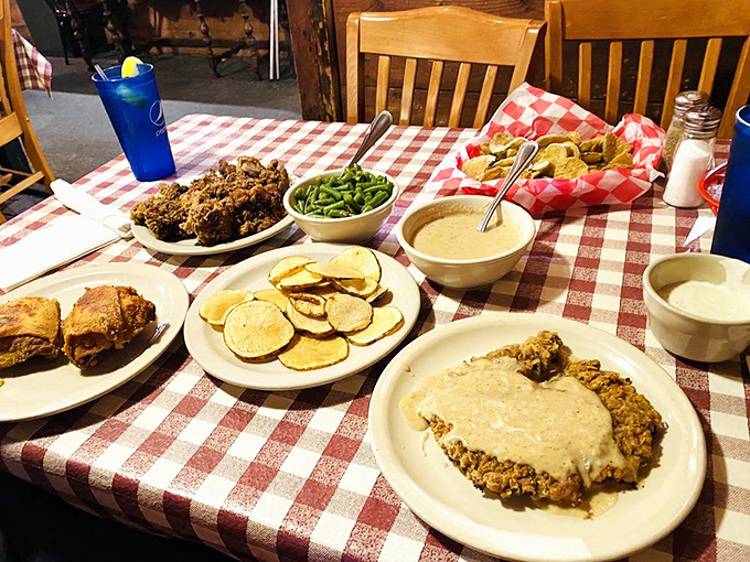 A table that could make a cardiologist wince but a soul sing. That chicken fried steak isn't just dinner—it's therapy with gravy.