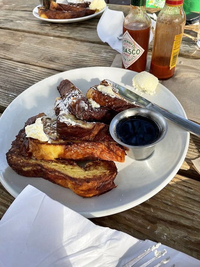 This French toast doesn't just break the fast – it demolishes it with golden perfection and a puddle of maple syrup that's practically begging for a skinny dip.