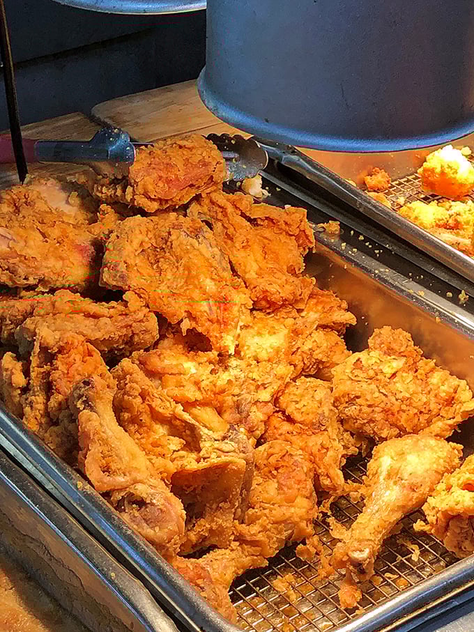 Golden-crusted chicken waiting in warm embrace, proving that patience isn't just a virtue – it's the secret ingredient to perfect Southern fried chicken.
