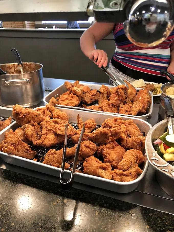Golden-brown fried chicken that would make Colonel Sanders weep with envy. This isn't just food—it's edible Southern heritage.