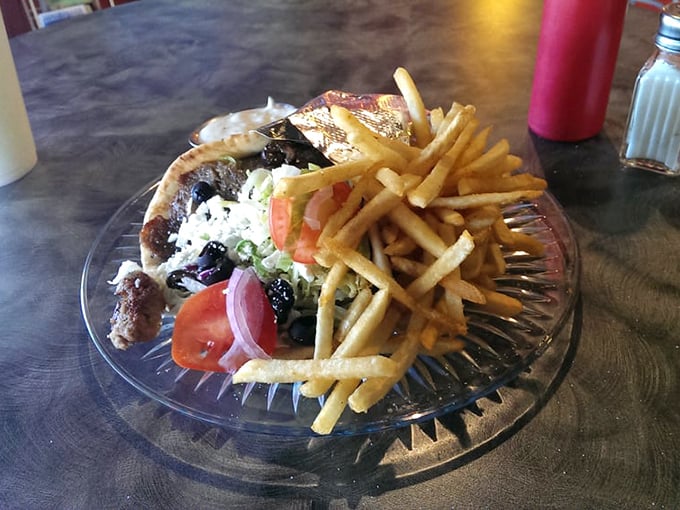 A gyro that demands to be photographed before eaten, though your patience will be tested with those aromas wafting upward.