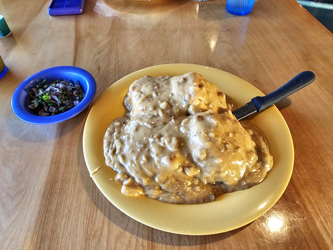 Biscuits and gravy so good they deserve their own ZIP code. This plate doesn't just feed you—it hugs your soul from the inside.