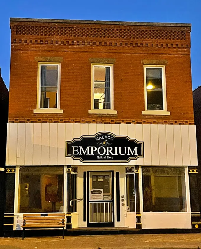 The Nauvoo Emporium promises "Quilts & More," and who among us hasn't been lured in by the promise of "& More"? Brick buildings and wooden benches—classic Americana. 