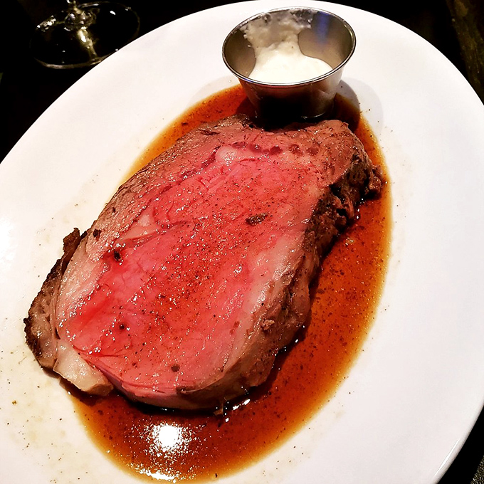 Pink perfection on a plate—this prime rib isn't just dinner, it's a meditation on patience, with a side of horseradish to wake up your senses.
