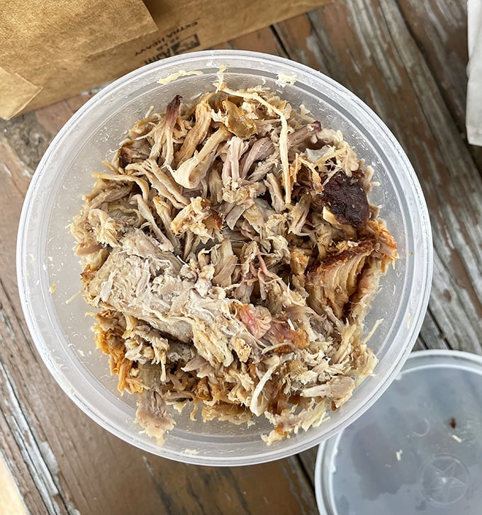 Behold the star of the show: hickory-smoked, hand-chopped pork. Notice those darker bits? That's the "outside brown"—the barbecue equivalent of striking gold.