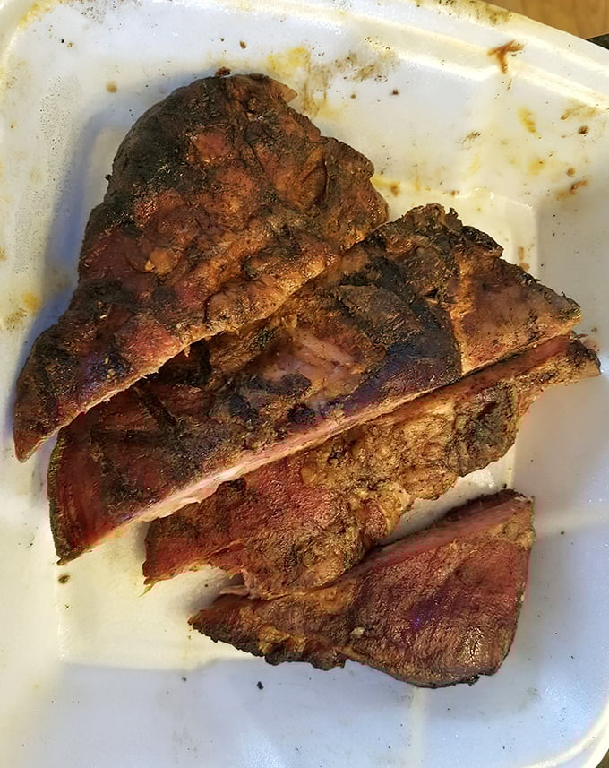 These ribs aren't just falling off the bone—they're practically jumping into your mouth. The smoke ring tells the whole delicious story.