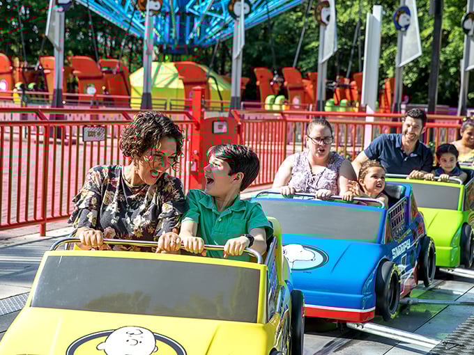 Joy in motion: The Snoopy-themed rides prove that happiness doesn't require triple loops or stomach-dropping plunges—just pure, simple fun.