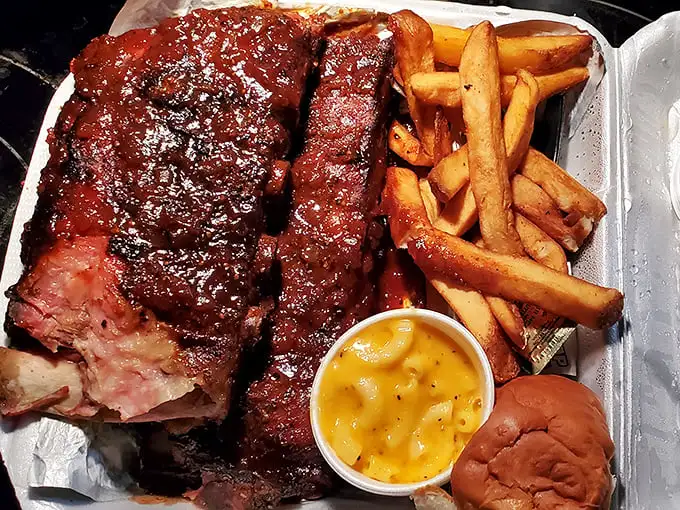 Behold: ribs that don't need a filter. That smoke ring isn't Photoshop—it's the result of patience, wood smoke, and barbecue wisdom passed through generations.