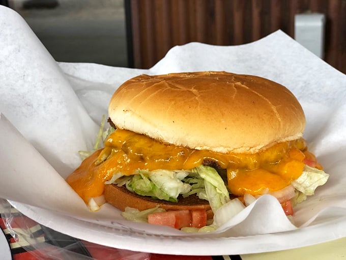 Not just melted cheese—this is a cheese waterfall cascading over fresh beef, creating that famous "cheese skirt" that San Antonians crave.