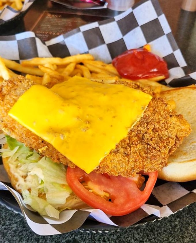 Behold the star of our show—a fish sandwich that makes landlocked Oklahomans forget they're 500 miles from the ocean. That golden crunch deserves its own soundtrack.