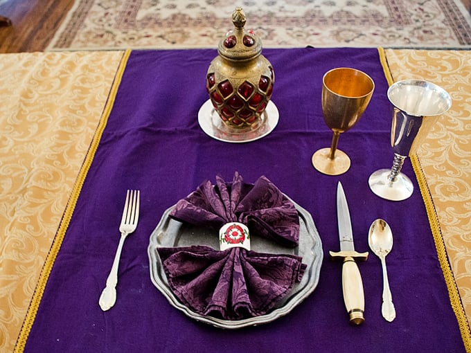 Dining fit for royalty with goblets that practically demand a hearty toast. "Huzzah" to elegant table settings that transport you through time.
