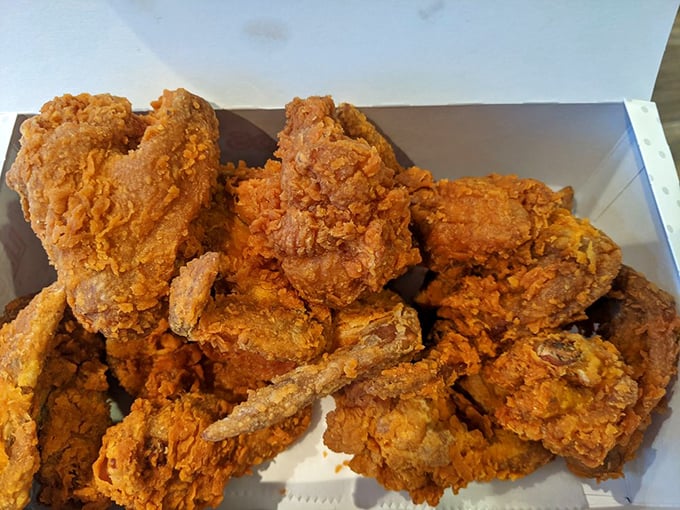 Golden-armored chicken pieces stacked like delicious treasure. If Midas was a fry cook, this is what he'd create – crunchy, glorious, worth-its-weight-in-gold goodness.