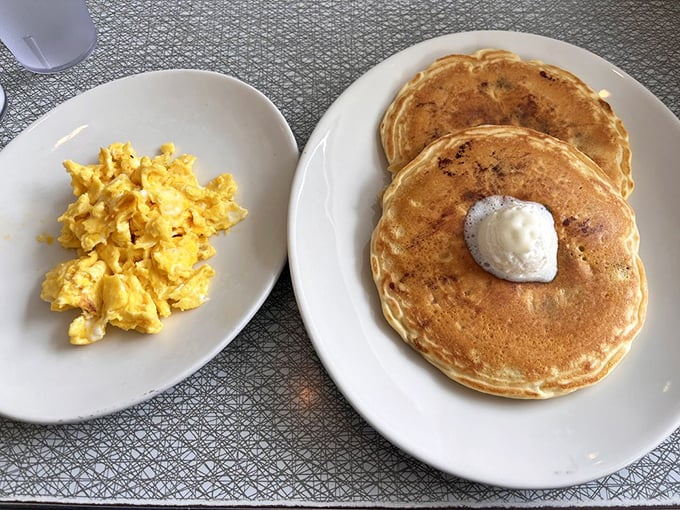 Golden pancakes and scrambled eggs—the breakfast equivalent of a warm hug from your favorite aunt. Simple perfection needs no introduction.
