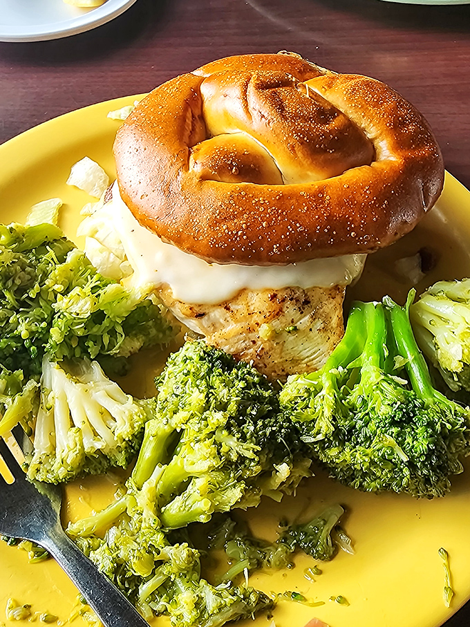 This isn't just chicken with a pretzel hat – it's a perfectly balanced plate where even the broccoli seems excited to be invited to the party.