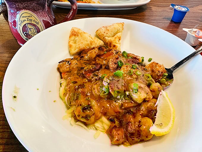 Shrimp 'n Grits that would make a Southerner weep with joy—plump Gulf shrimp nestled on creamy cheese grits with garlic bread for sopping.