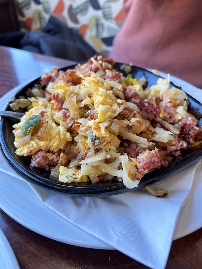 This skillet is what happens when hash browns, eggs, and corned beef have a beautiful reunion after being separated for far too long.