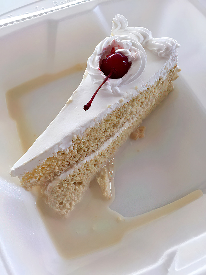 The star of the show: tres leches cake so moist it defies physics. That cherry on top isn't garnish—it's the exclamation point on a perfect dessert sentence.