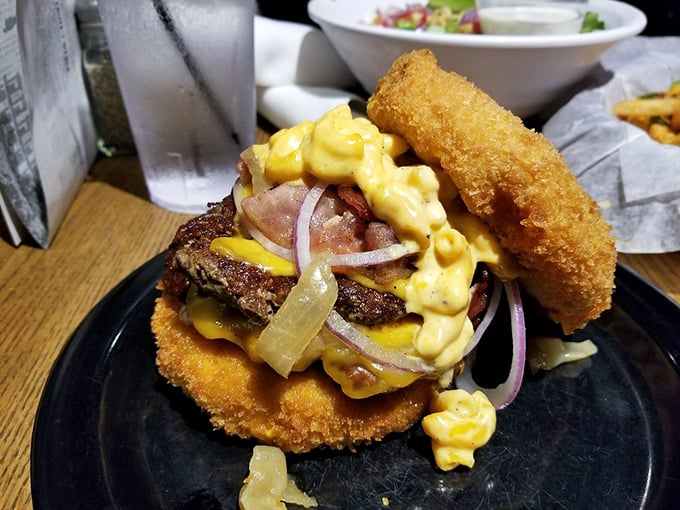 The Walking Ched isn't just a burger—it's architecture. Fried mac and cheese replaces bread in this monument to delicious excess.