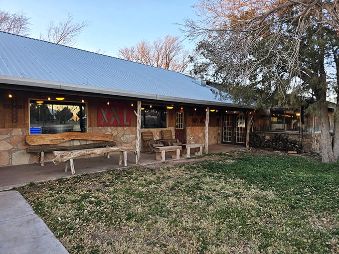 Stone walls and rustic benches welcome you like an old friend – no pretension, just great steaks ahead.