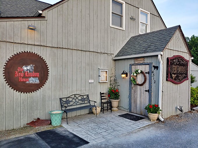 The New London Steak House's rustic charm and saw blade logo hint at the no-nonsense meat mastery waiting inside.
