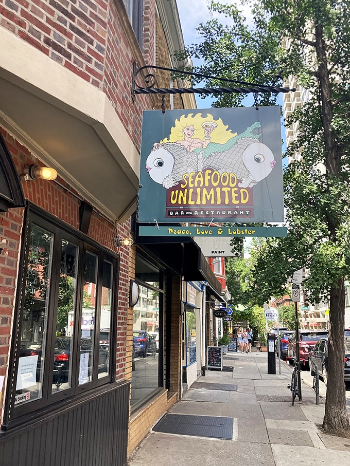 Seafood Unlimited's playful sign promises "Peace, Love & Lobster" – the hippie movement's best contribution to the food world!