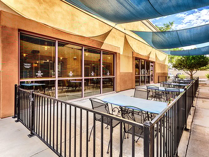 The patio at Oscar's offers the perfect stage for their seafood stars to shine. Those blue tables have witnessed countless "wow" moments from first-time visitors.