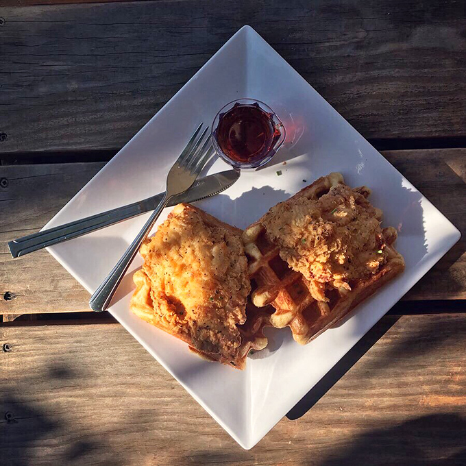 Sunshine streaming onto this chicken and waffle plate creates a halo effect—proof that some food really is heaven-sent.
