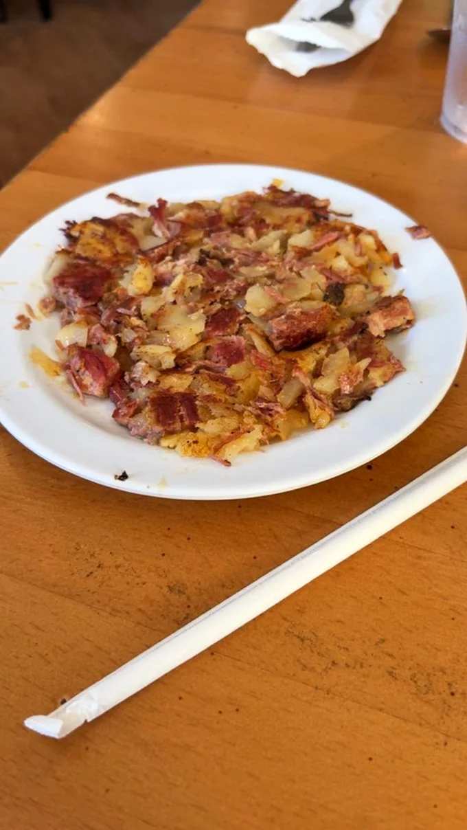 Corned beef hash that's actually mostly corned beef? Revolutionary! This plate has the perfect crispy-to-tender ratio that breakfast aficionados dream about.