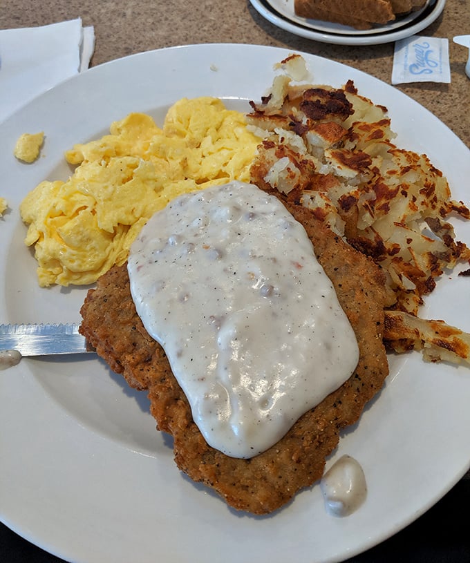 Country fried steak with eggs and hash browns—the breakfast equivalent of hitting the lottery. That crispy-to-tender ratio is what diner dreams are made of.
