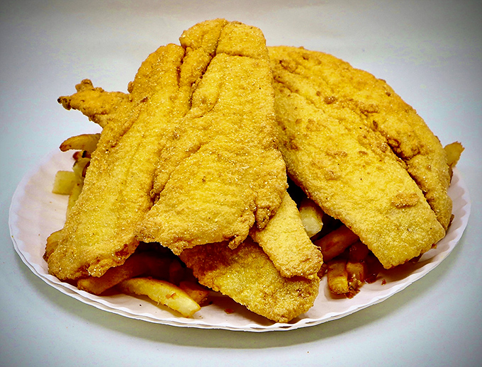 These fried fish fillets and fries aren't just a meal—they're edible sunshine that would make any New Englander homesick.
