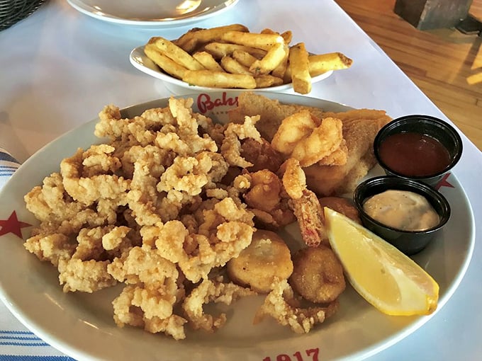 The seafood platter that launched a thousand road trips. Those golden-brown treasures aren't just fried clams—they're edible souvenirs from the Jersey Shore's culinary heritage.